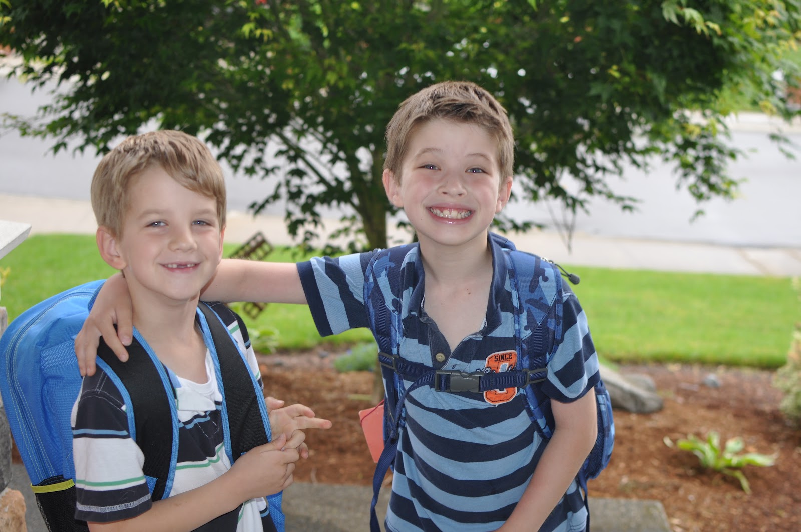 Lovin' on my boys... and sweet girl!: Our first and third graders!!