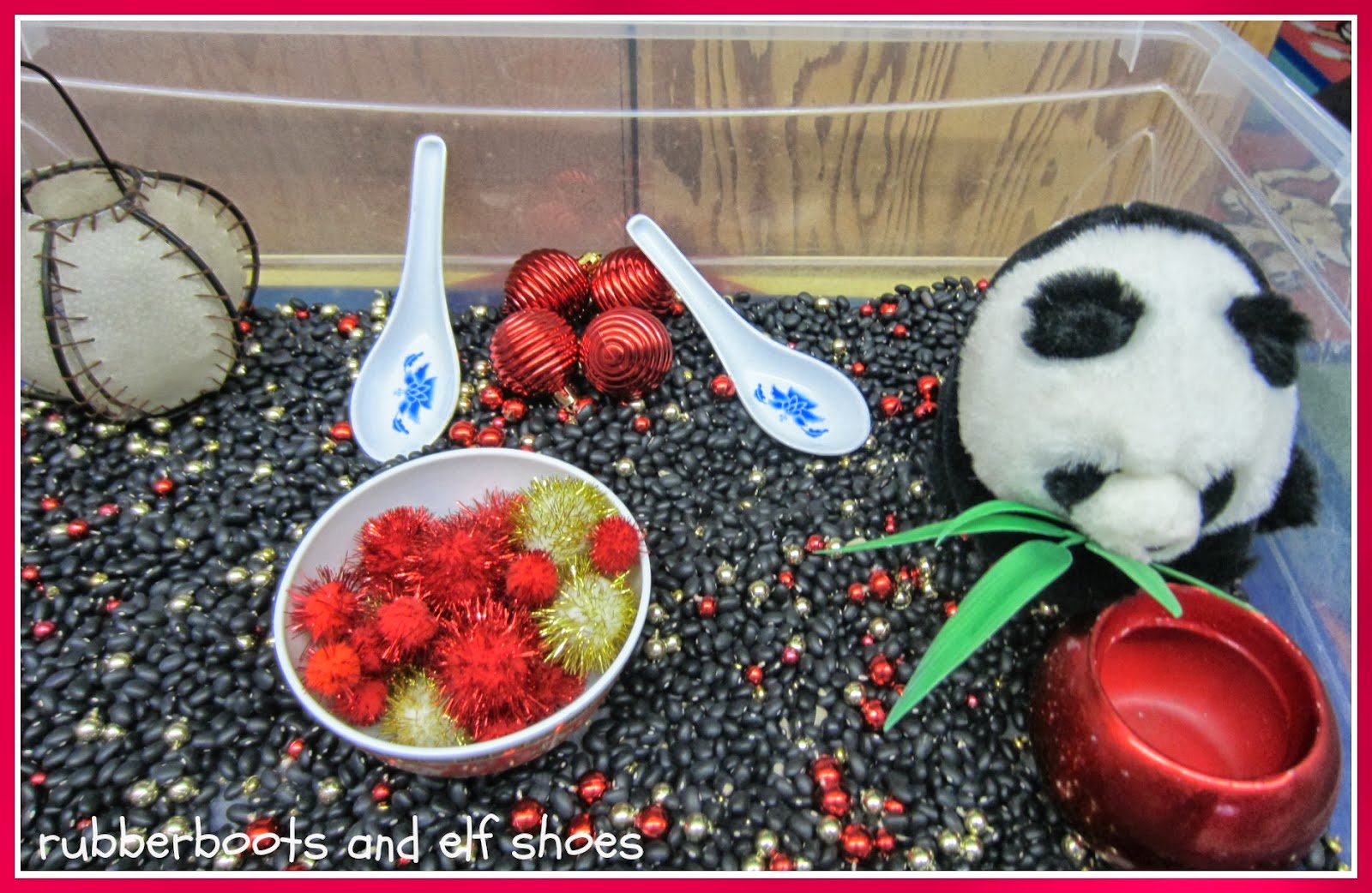 Lunar New Year sensory bin - rubber boots and elf shoes