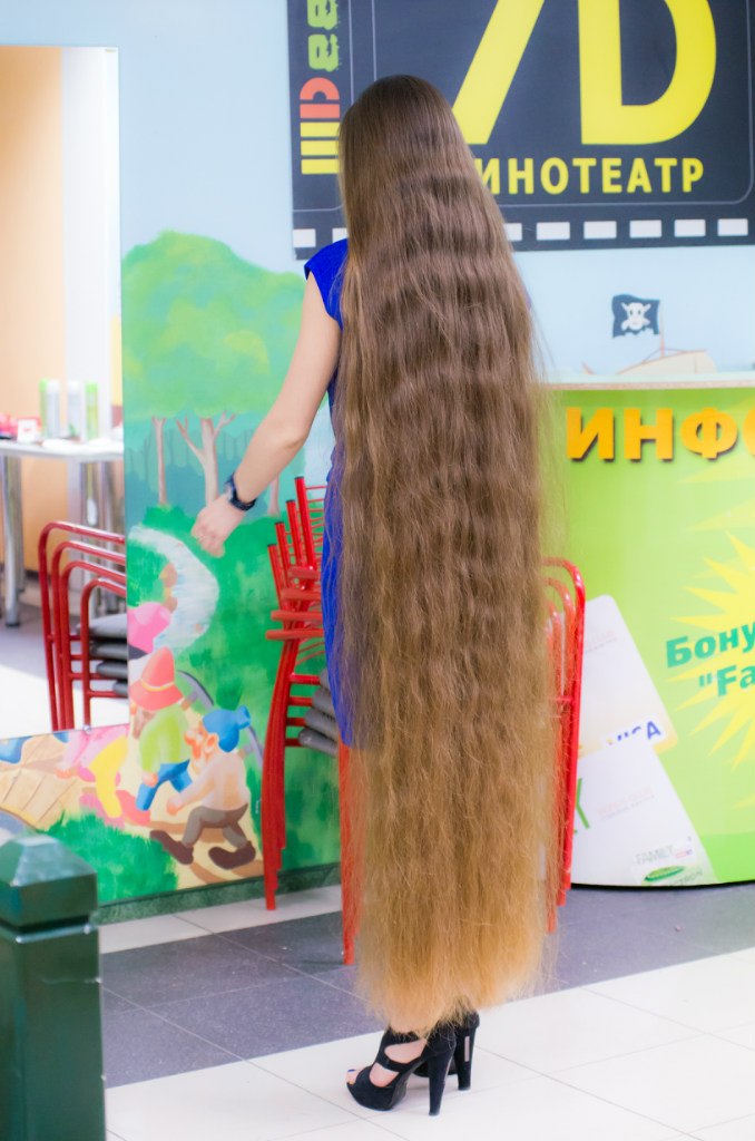 Long hair girl shows off her floor length hair|Girls with very long hair