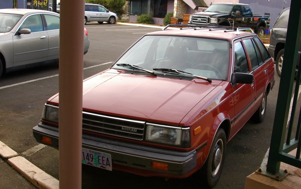 OLD PARKED CARS.: 1985 Nissan Sentra Wagon.