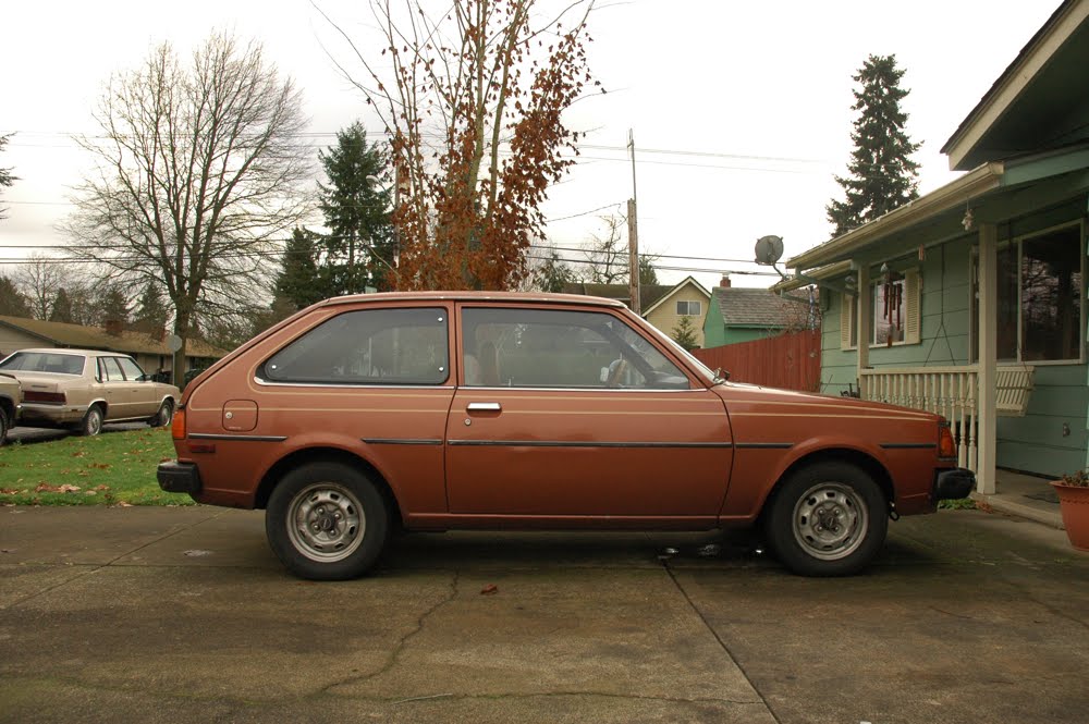 OLD PARKED CARS.: 1980 Mazda GLC.