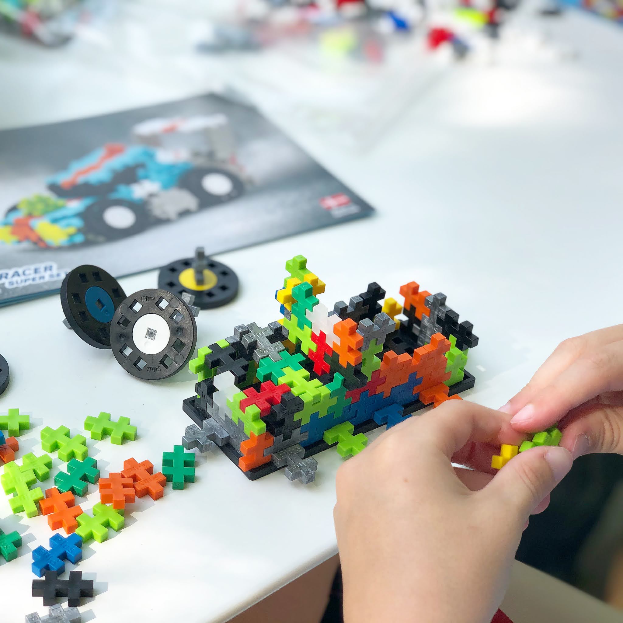 Find the Little Mind: Open-ended Car Creating with Plus-Plus GO!