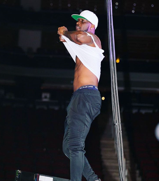 Peter Psquare Okoye shows off his abs on stage