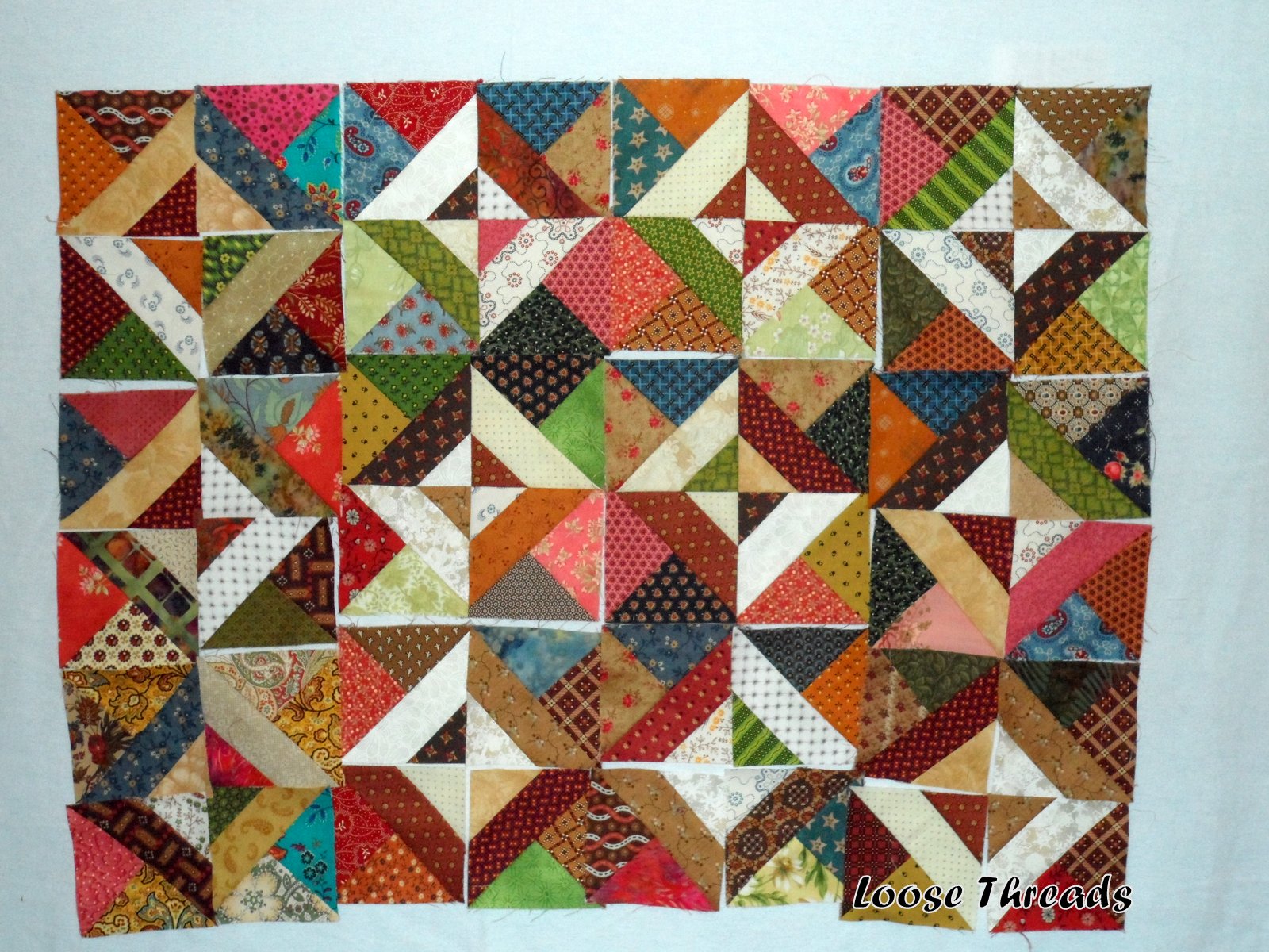 Loose Threads: Strips and Triangles Scrap Quilt