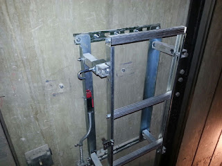 Chicago Elevator Maintenance - Colley Elevator: Retractable ladders ...