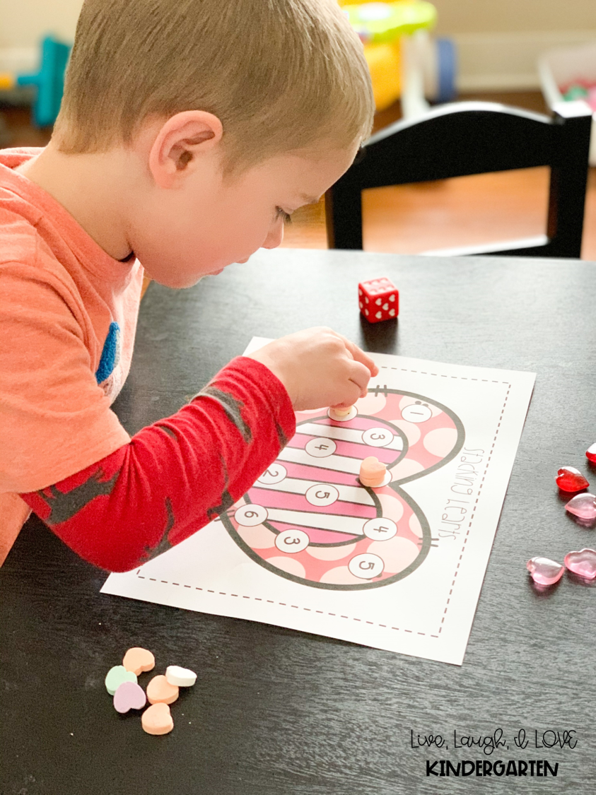 After we rolled, we used candy hearts and stacked them to match the number!
