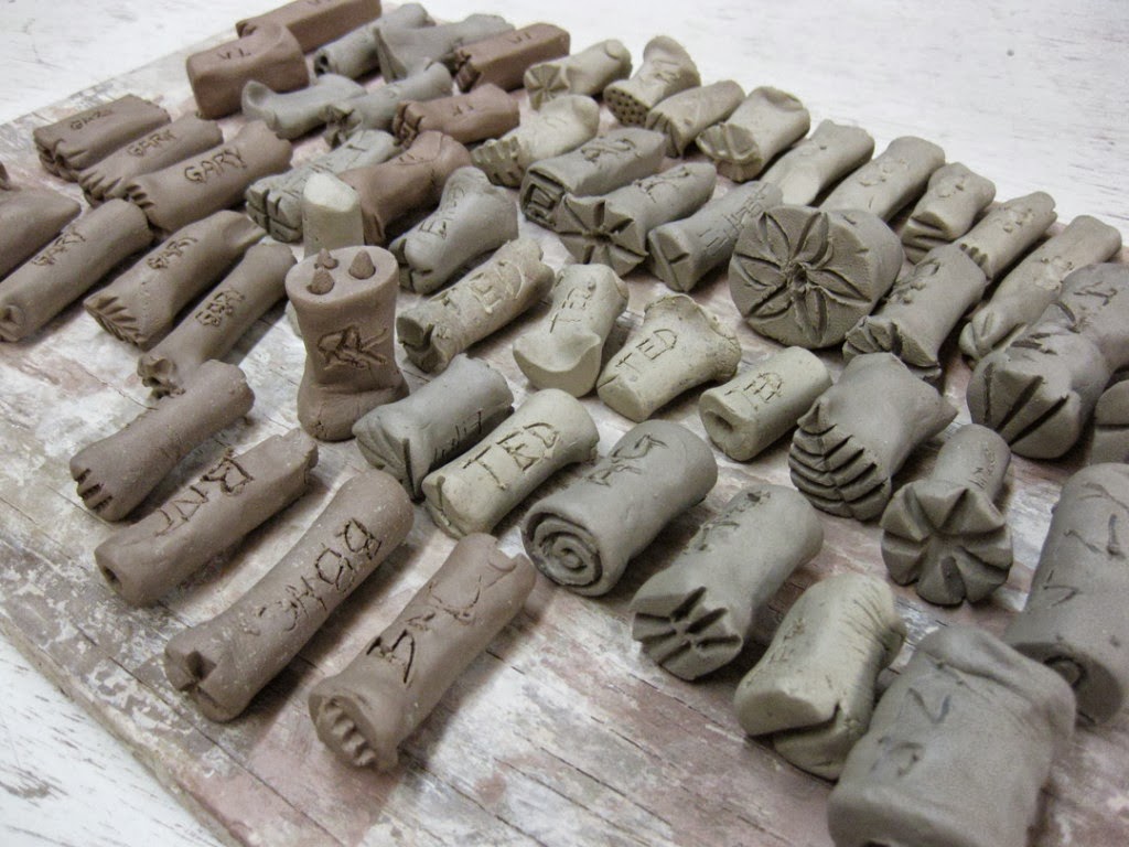 Clay shares: Stamped and found textured mugs