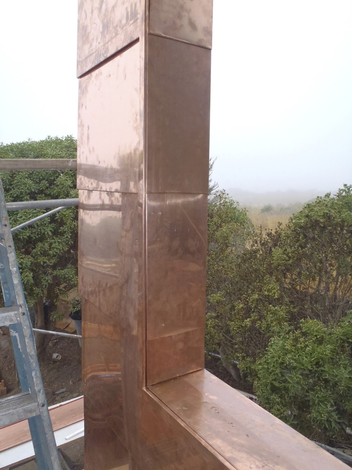 O'Connor Sheetmetal: Custom copper siding panels