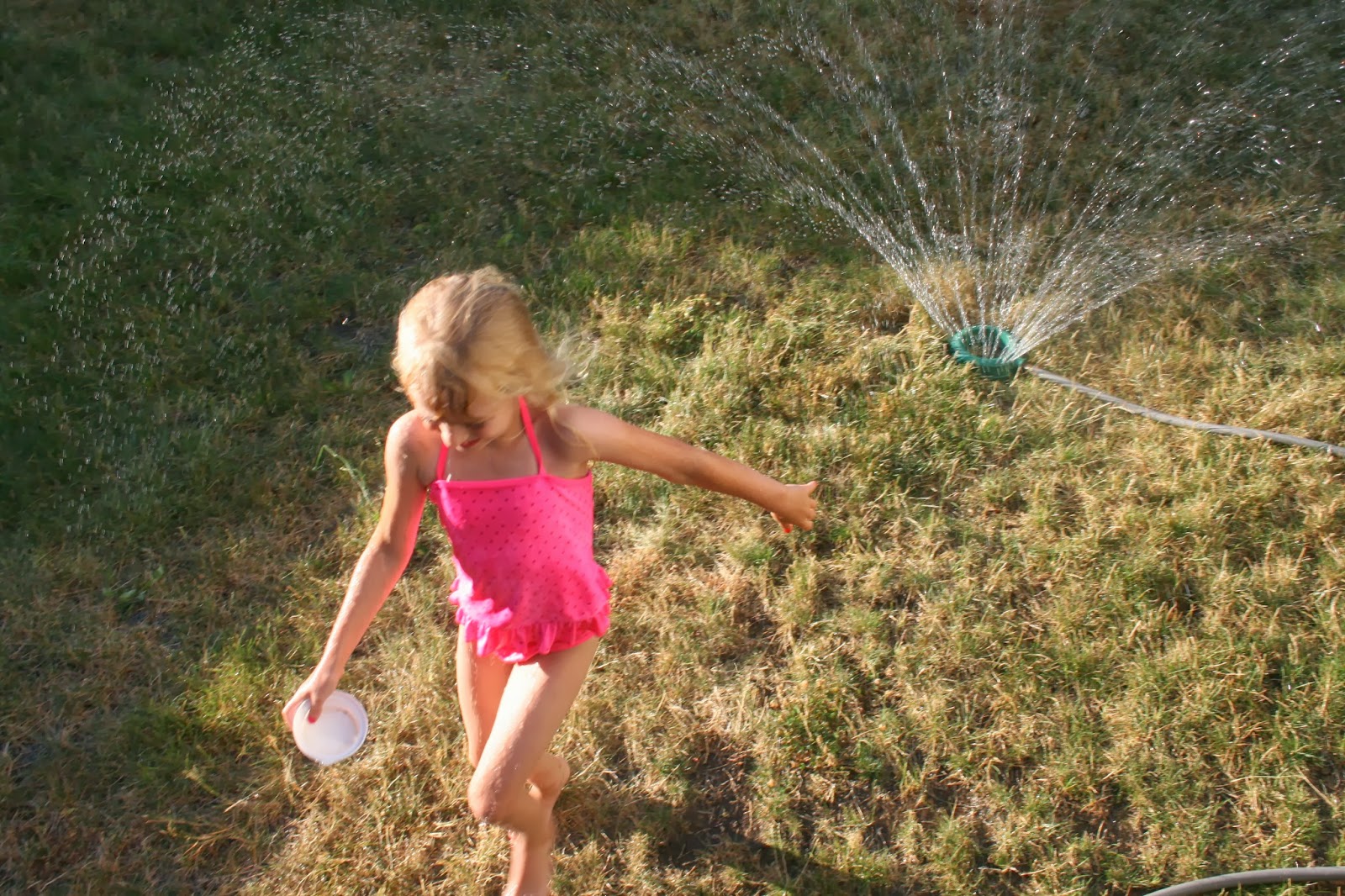 The Morrill Family: Sprinkler fun!