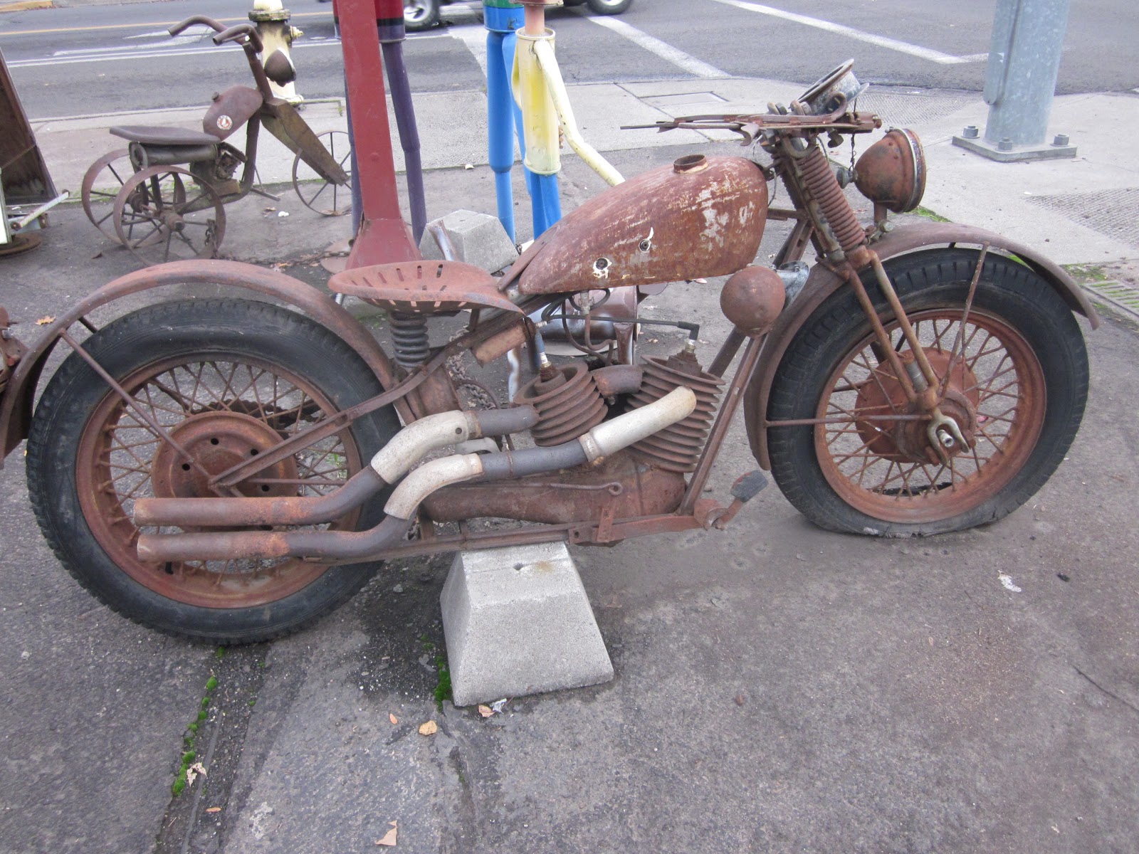 OldMotoDude: Folk Art Vintage Motorcycle at muffler shop in Walla Walla, Wa