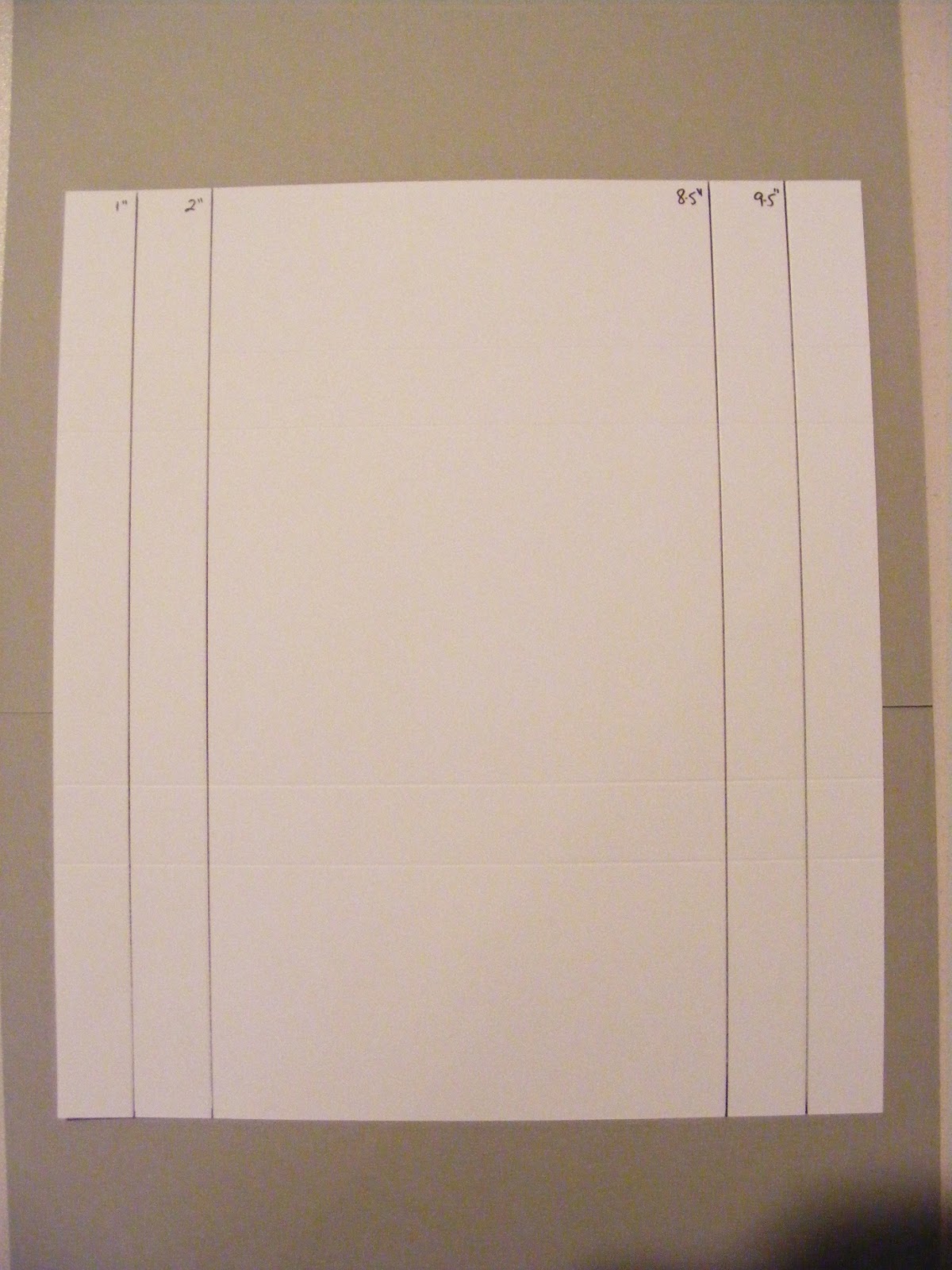 Along the 10.5" side you will score at 1", 2", 8.5" and 9.5"".