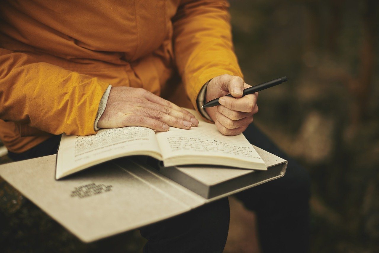 A Person Writing A Story