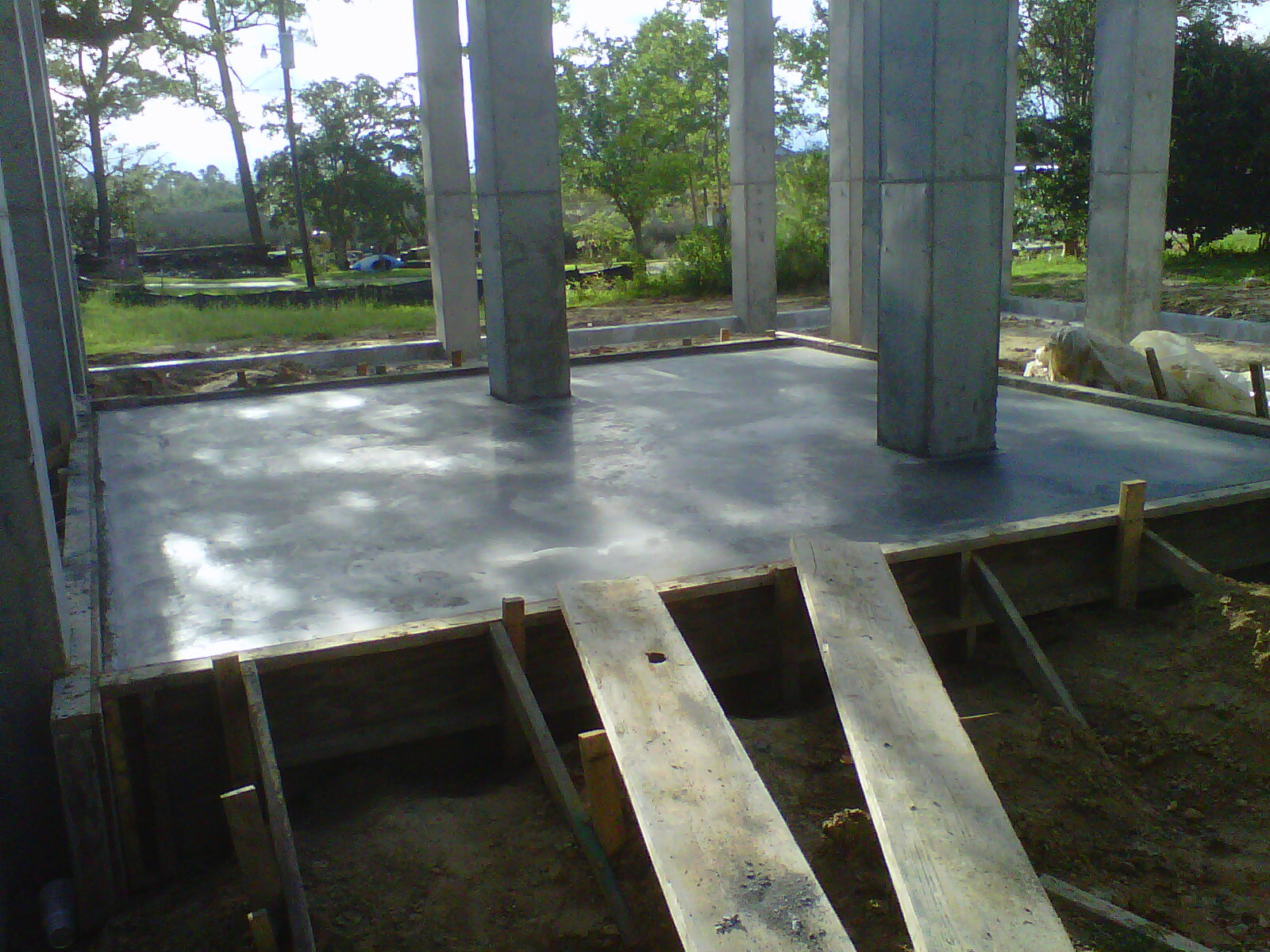 Porteaux Progress: First Slab section, and Waterfront Pilings