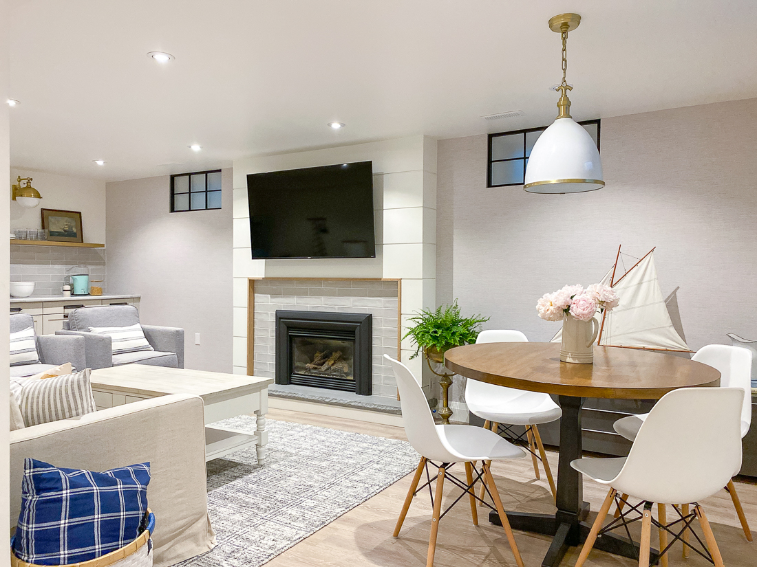 A Bright and Neutral Basement One Year Later - Rambling Renovators