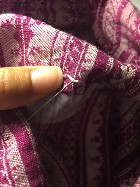 How to fix a Broken Thread in your woven wrap.