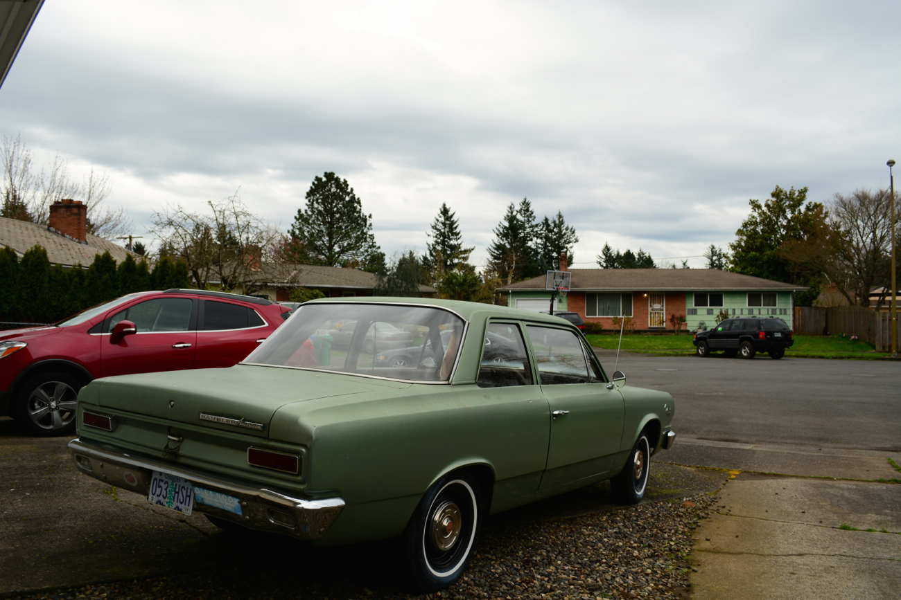 OLD PARKED CARS.: 1966 Rambler American 220.