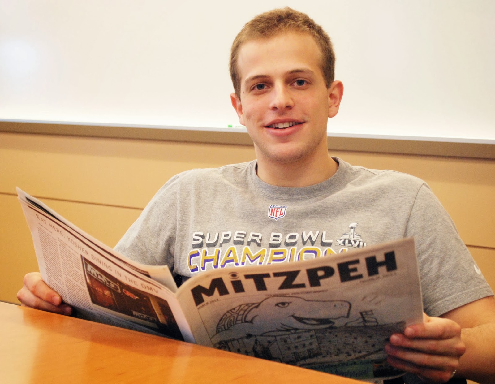 Intro to Multimedia Reporting: In class portrait of Evan Sery