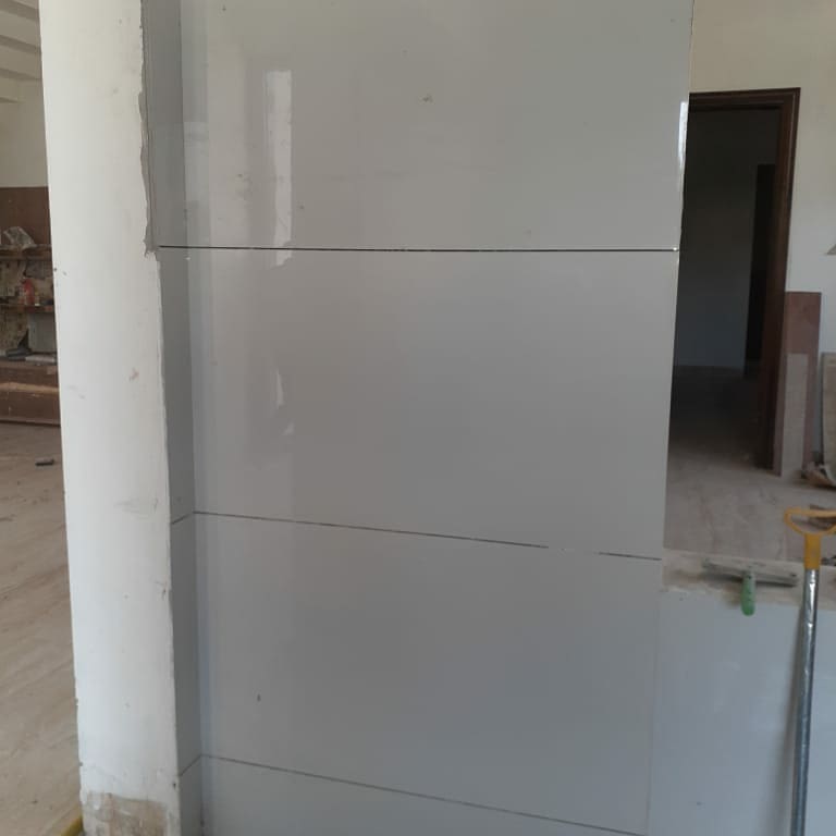 Some tiles work in house. Wall tile work in dressing room and outdoor ...