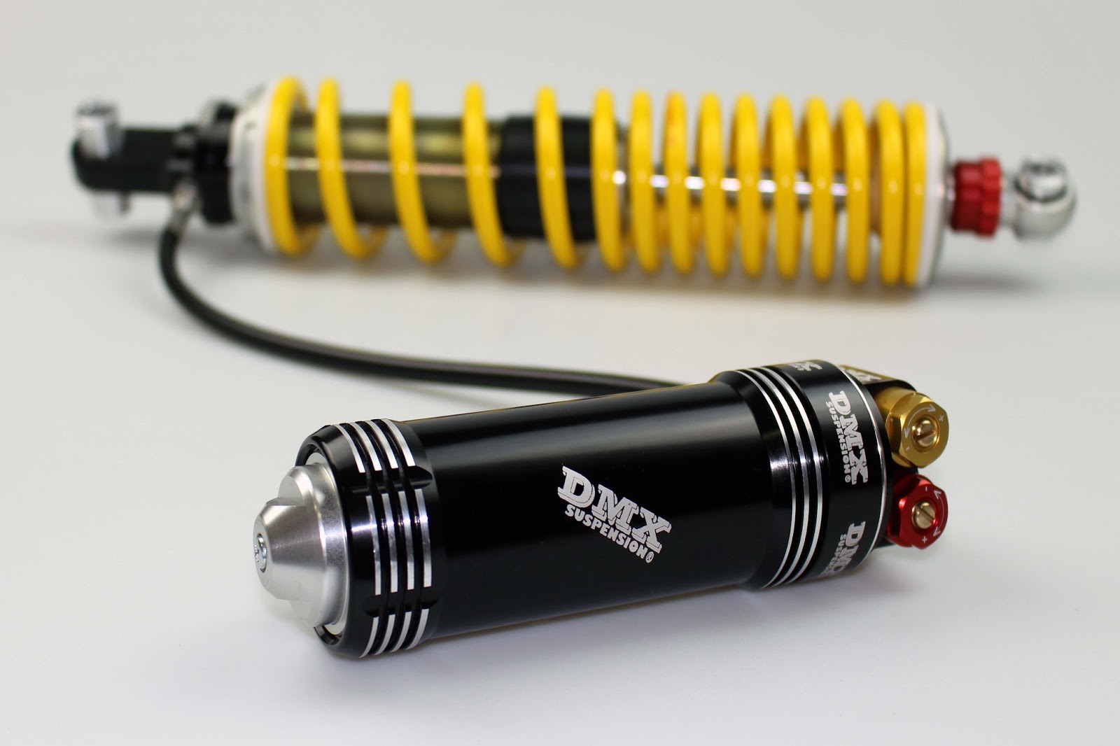 DMX SUSPENSION: Amortiguador DMX Car Cros doble regulación (Latiguillo)