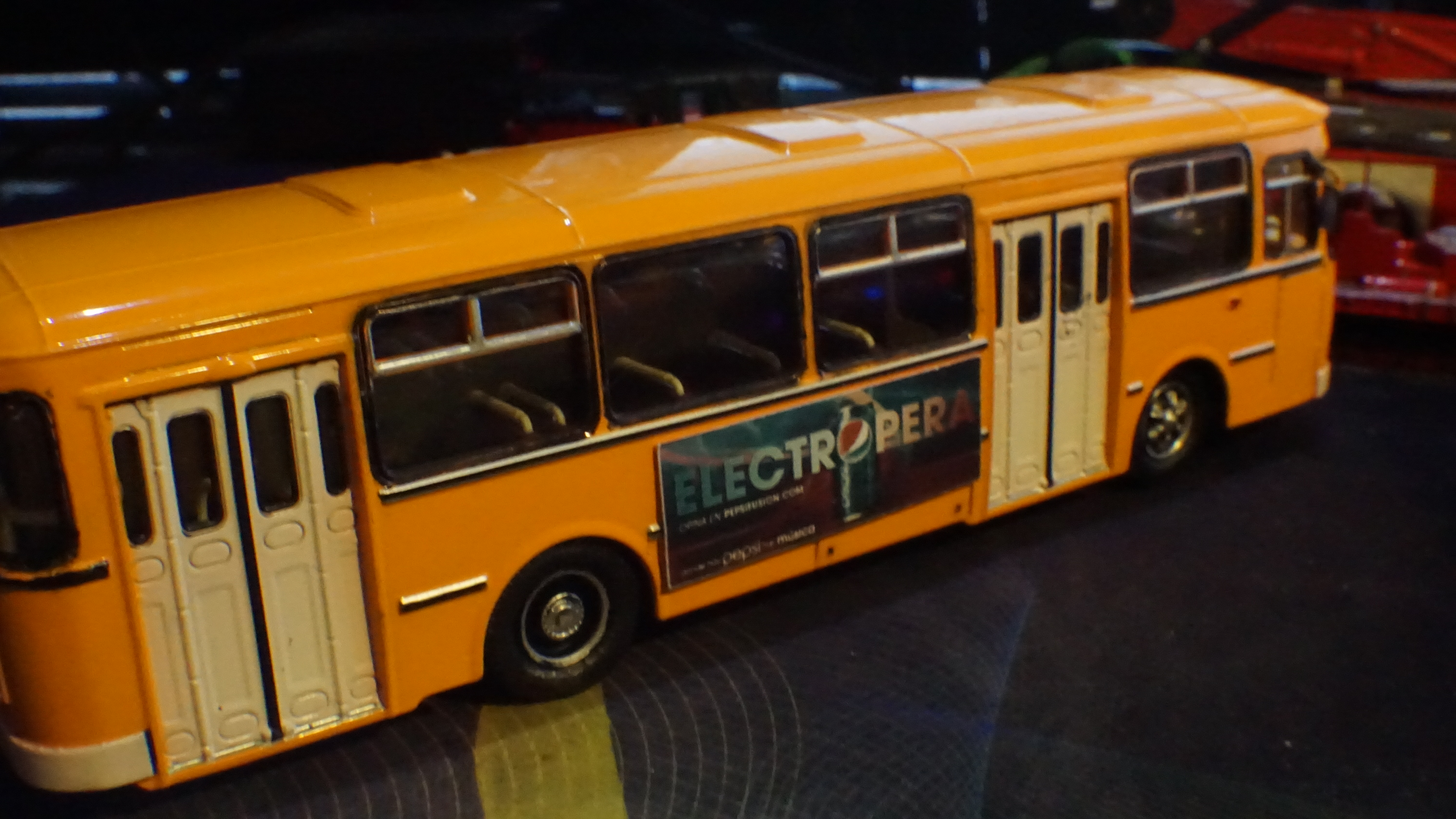 Cars on the Shelf: Ads on 1/43 bus model