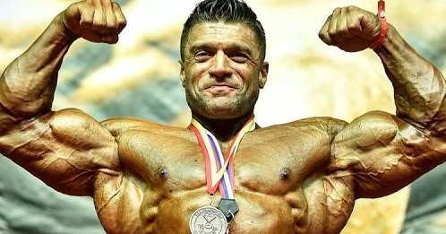 world bodybuilders pictures: Turk bodybuilder Firat Urun biggest arms ...