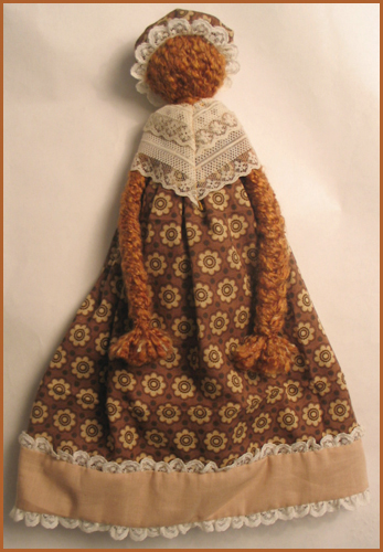 wrap and tie a prairie yarn doll | Art Education Daily