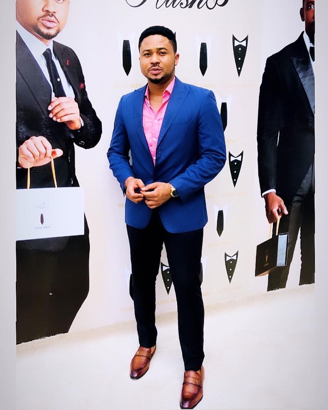 Pictures of Mike Godson standing tall