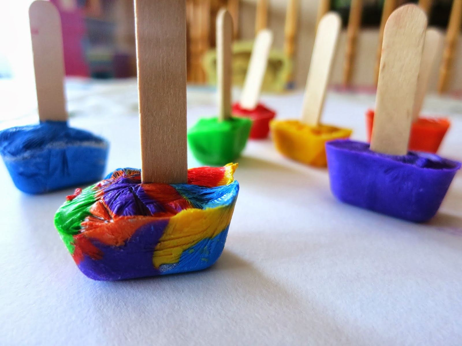 Learn with Play at Home: Paintsicles. Frozen paint cubes for creative fun.