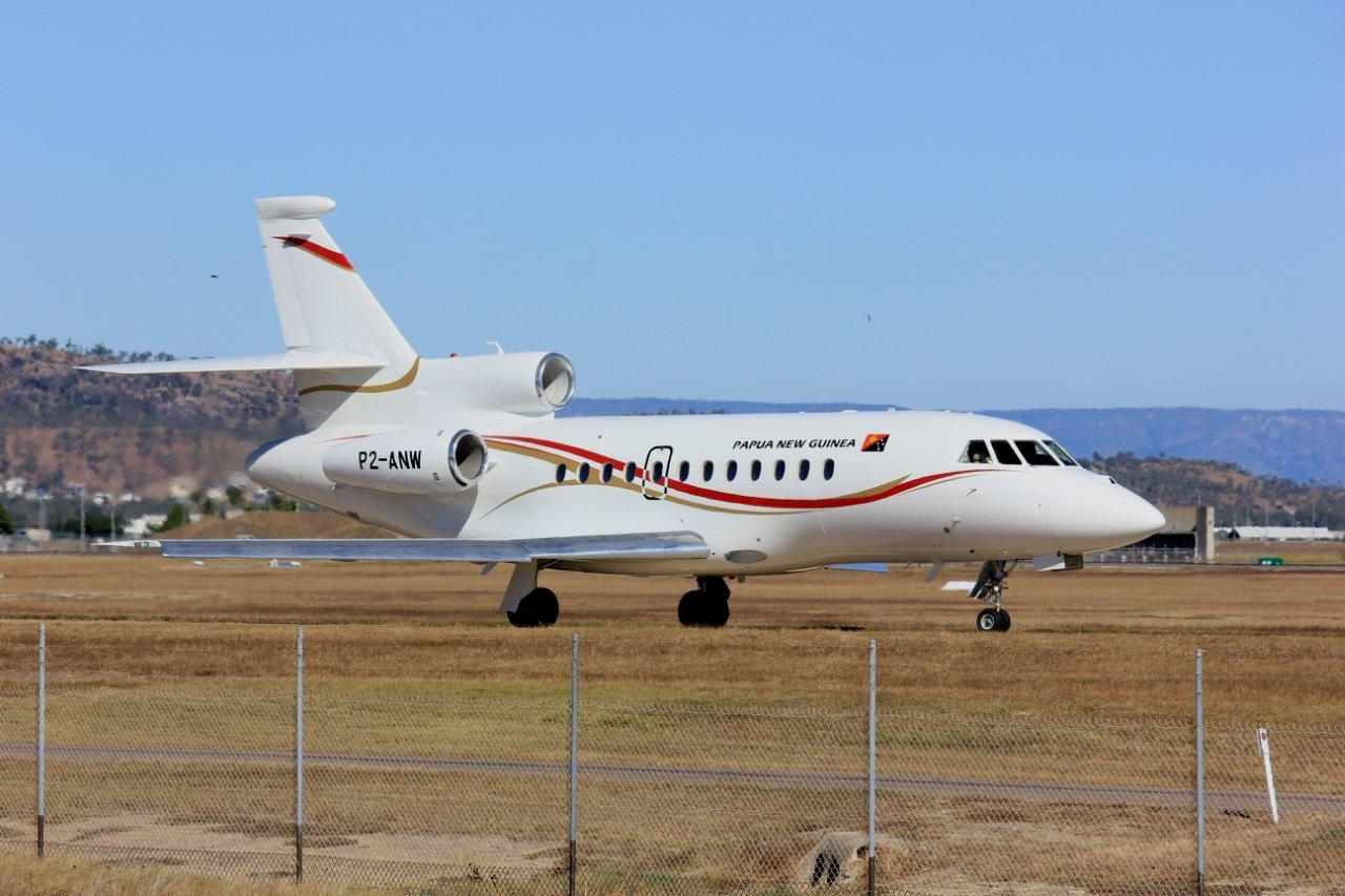 Far North Queensland Skies: Air Niugini Falcon 900 P2-ANW departs
