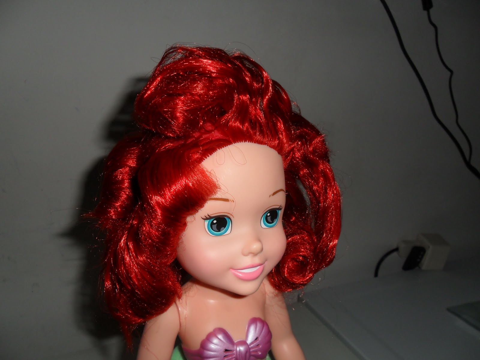 Olive Groves and Doll Knits: Ariel's hair styling session.