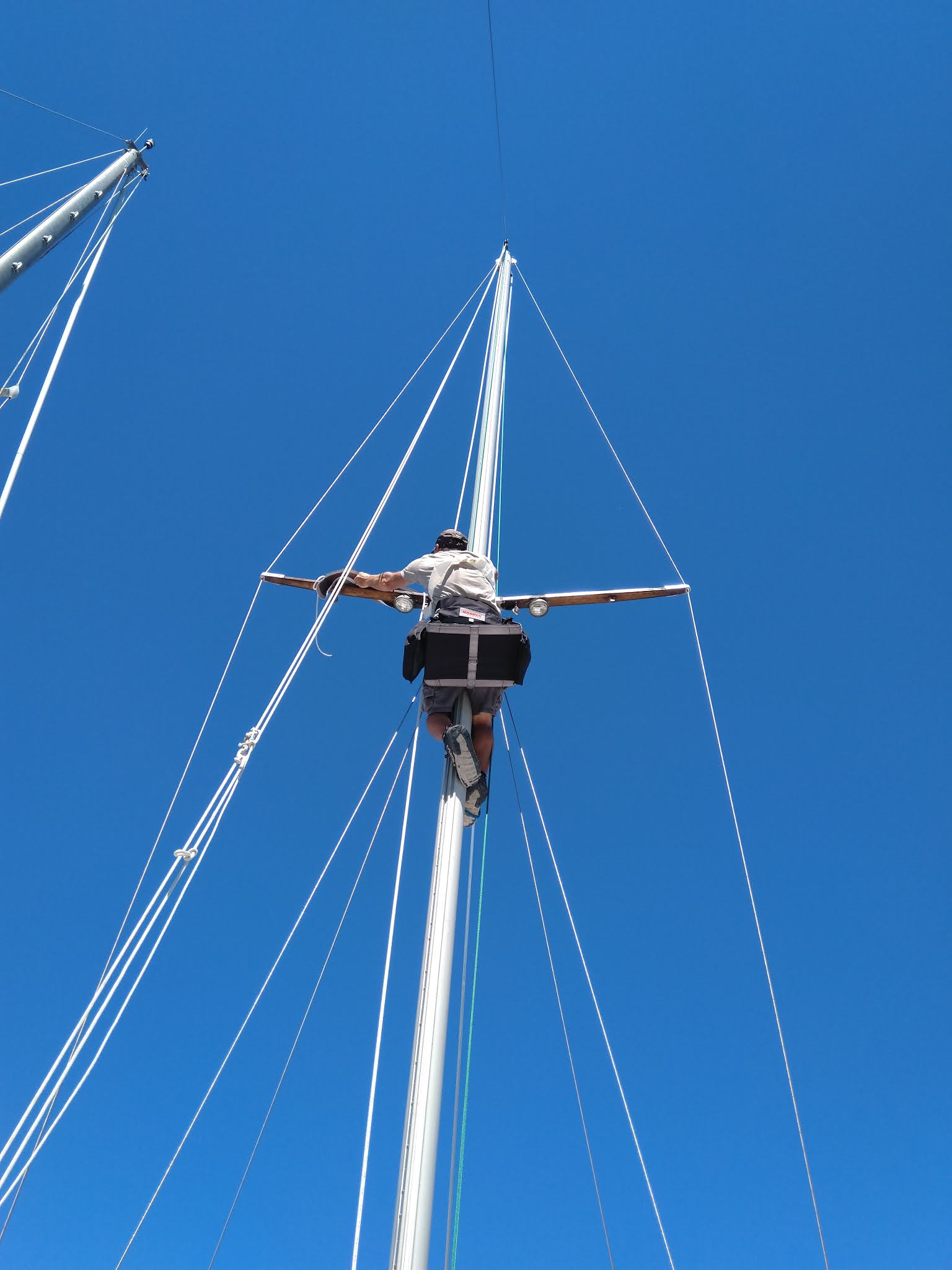 Cruising - Team Rogers: Mast Monkey ~ Installing Spreader Boots