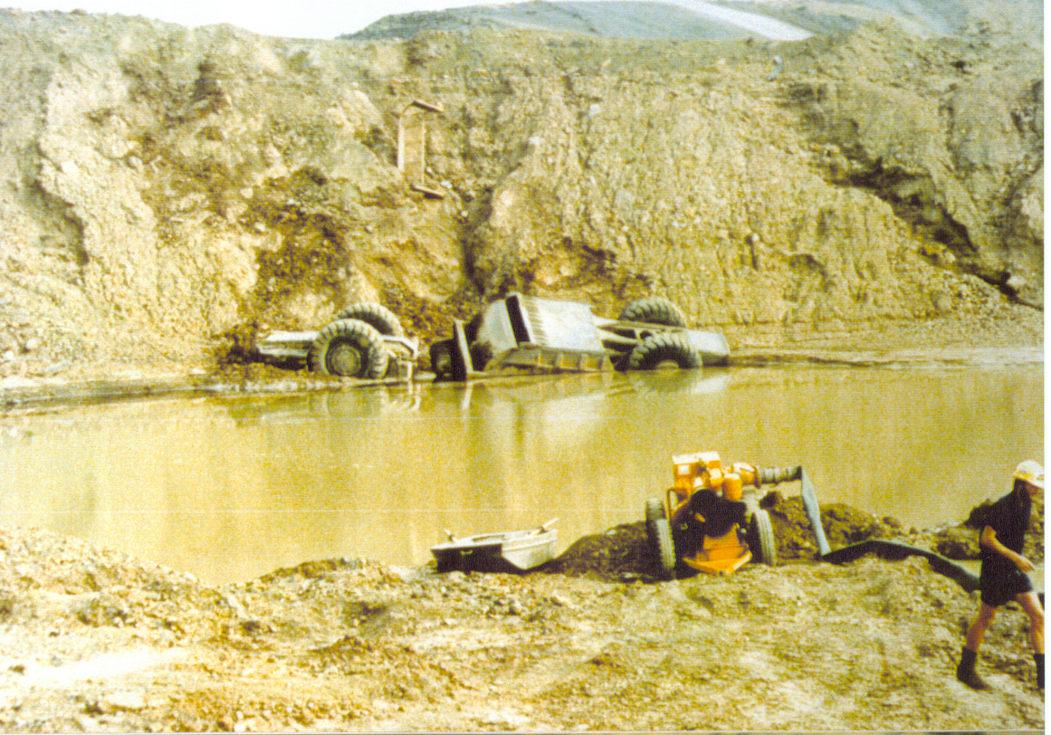 Mining Mayhem: Scraper in Mud