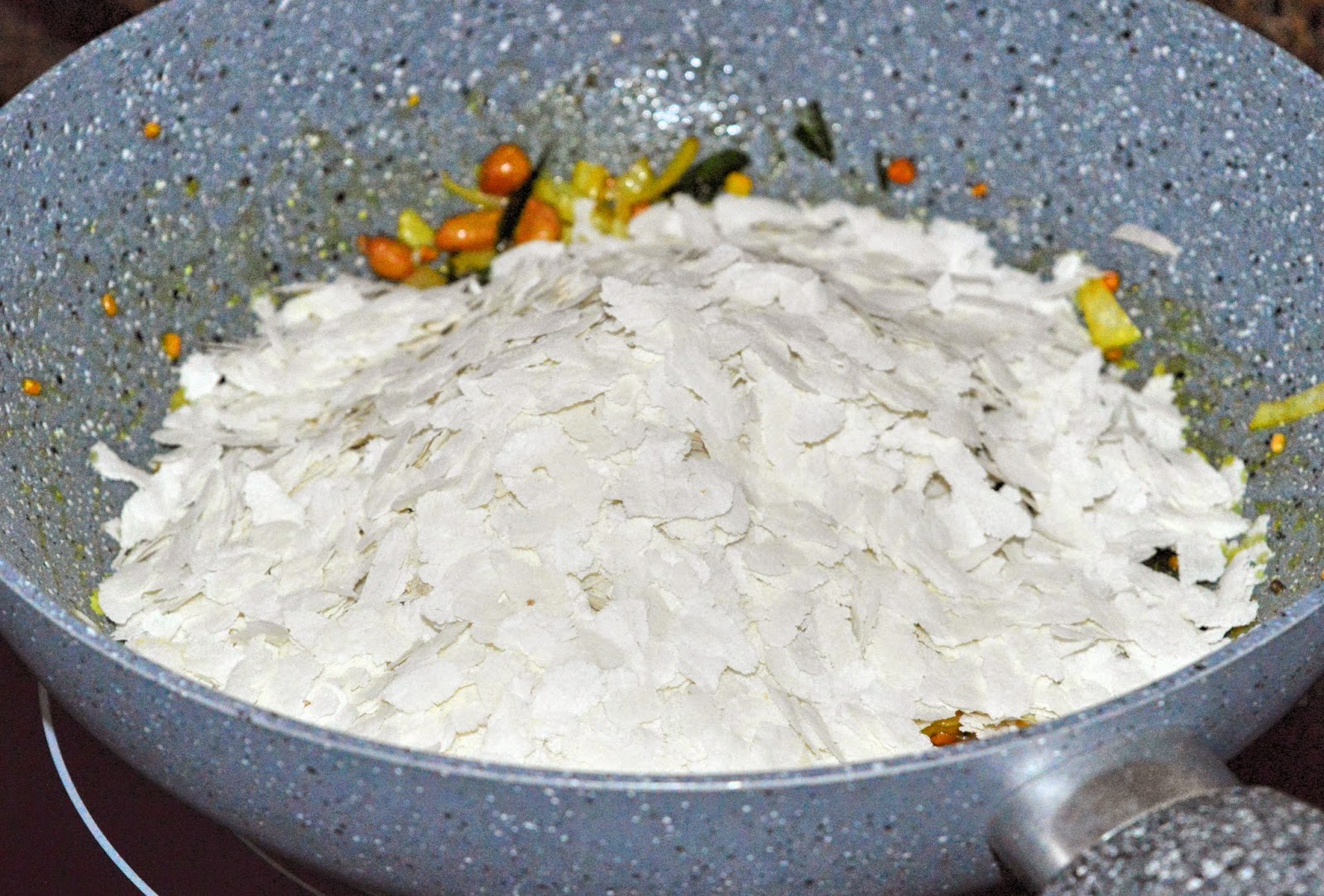 exotic-n-easy cooking: Kache Aam Ka Poha (Raw Mango and Flattened Rice)