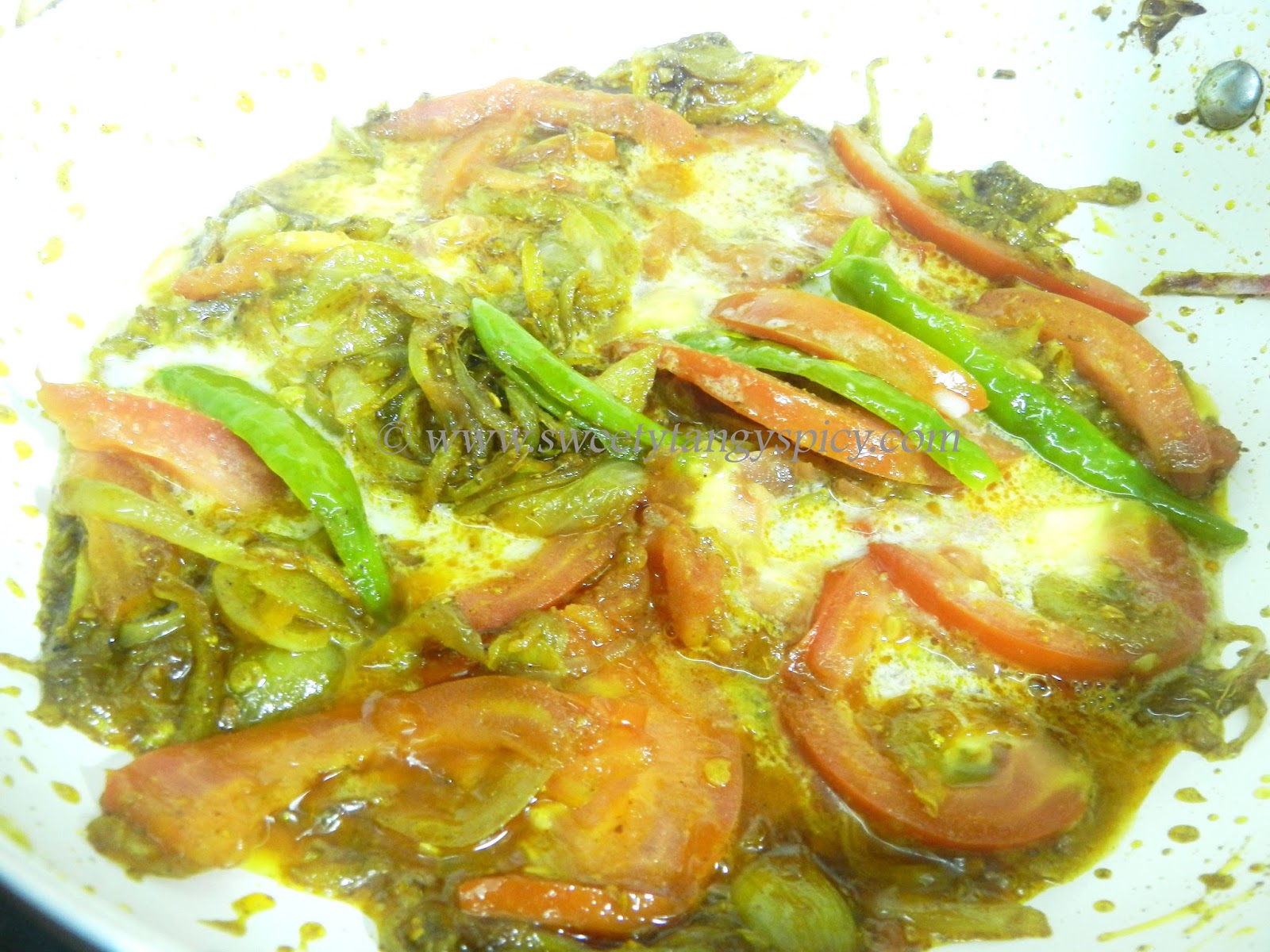 Once the oil starts separating from the sides, add in 1 1/2 cups of ...