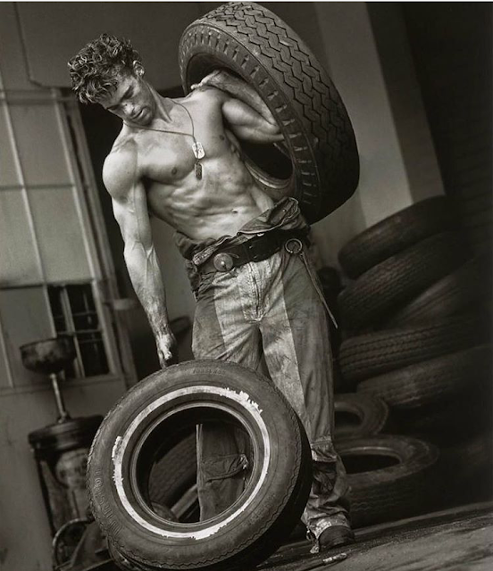 As time goes by: Fred with tires 1984 by Herb Ritts