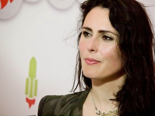 Does Dutch Sharon den Adel fit better in Sweden or Switzerland?