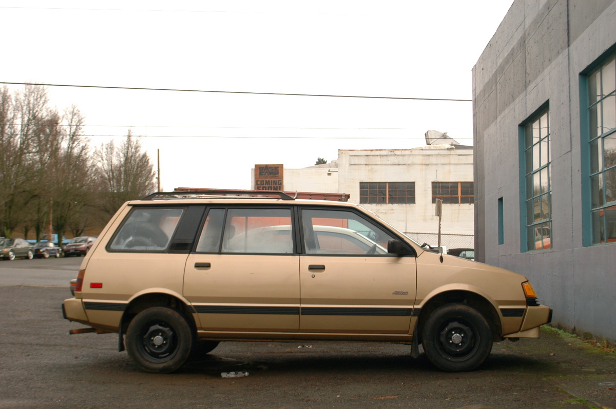 OLD PARKED CARS.: 1987 Colt Vista.