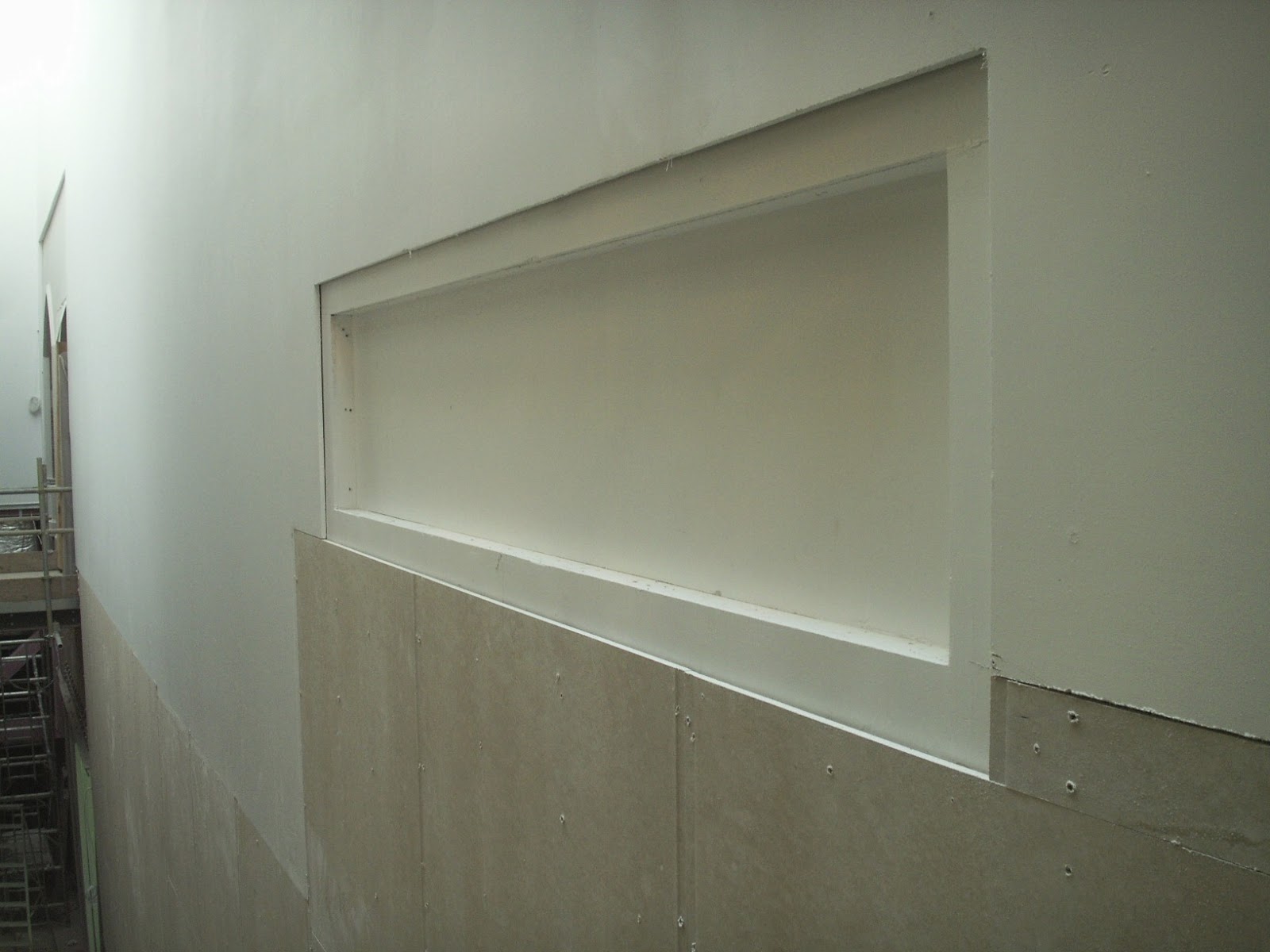 D.R. INTERIORS: 9m(high) x 40m (long) two walls in the slot (walls done ...