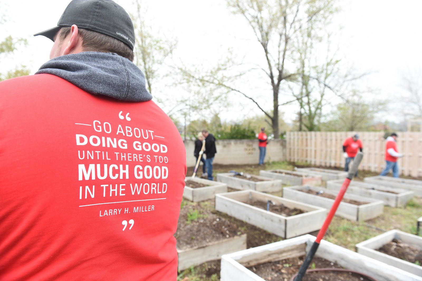 Larry H. Miller Group Pitches In At Community Gardens