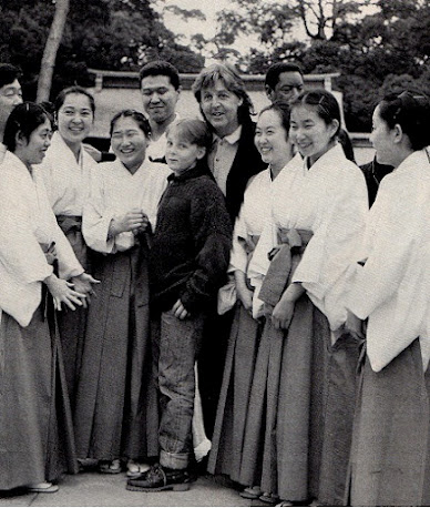 Meet the Beatles for Real: Surrounded by ladies