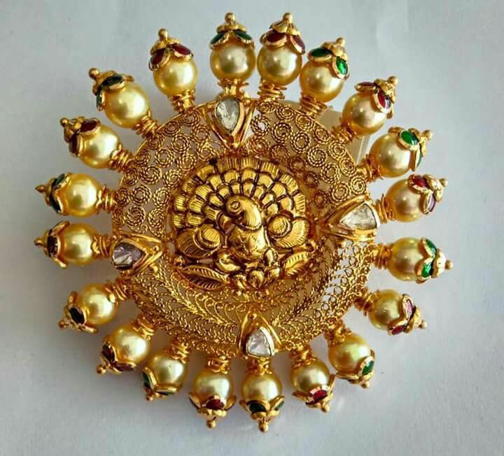 Golden brooch designs