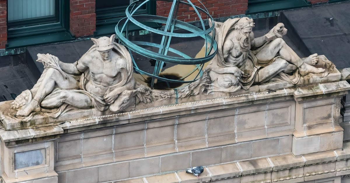 Shot of the Day: Two Greek Gods and a Pigeon