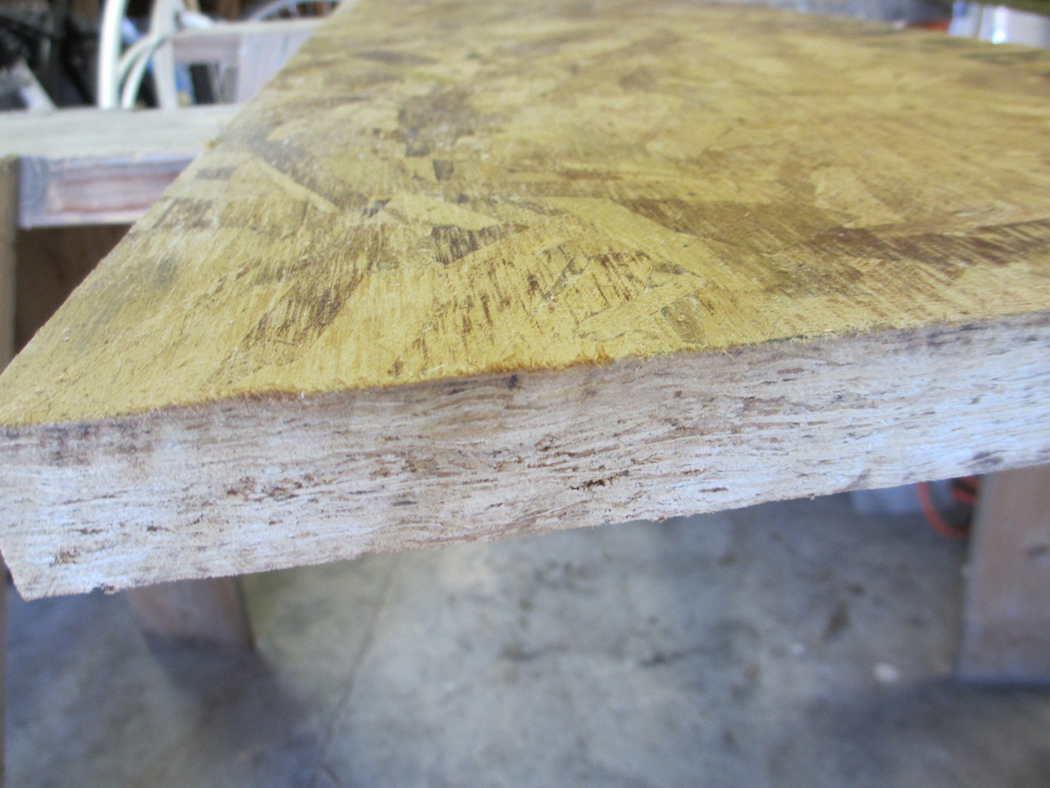 our homegrown spud: a couple of DIY OSB tables.