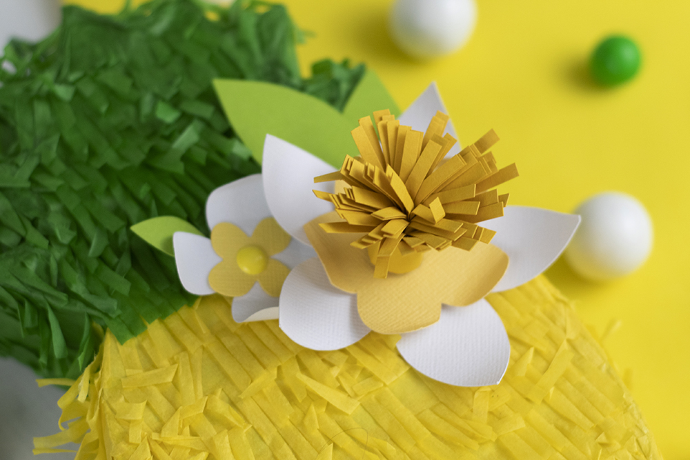 Pinata DIY: Personalizing a Pineapple Pinata with Tropical Flowers ...