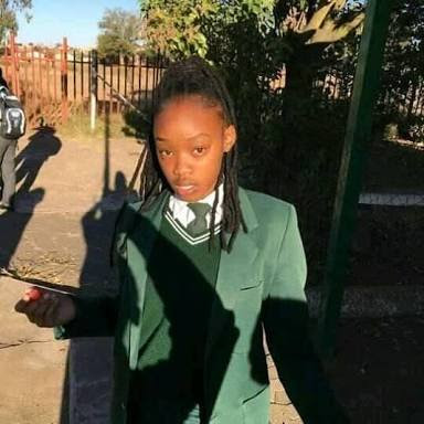 Photos of The Bomb RSA Andiswa Selepe in school uniform
