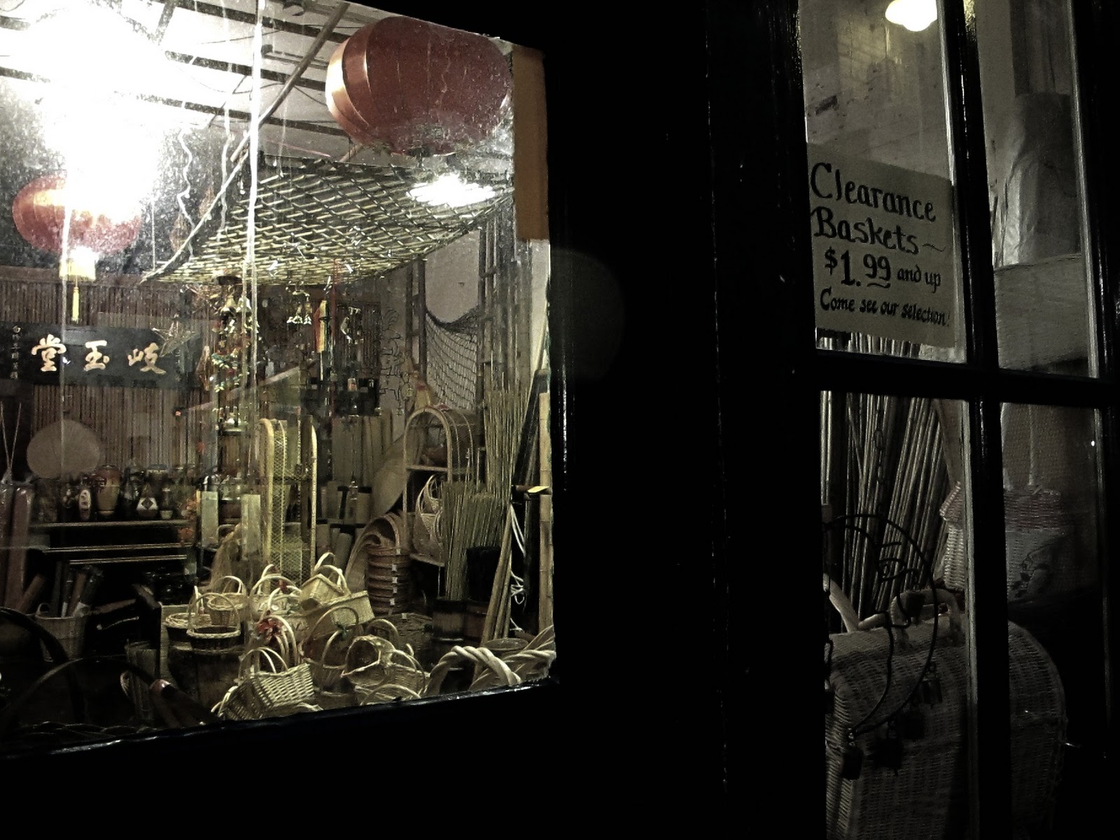 Peering into shop windows in Fan Tan Alley one spooky night, and a ...