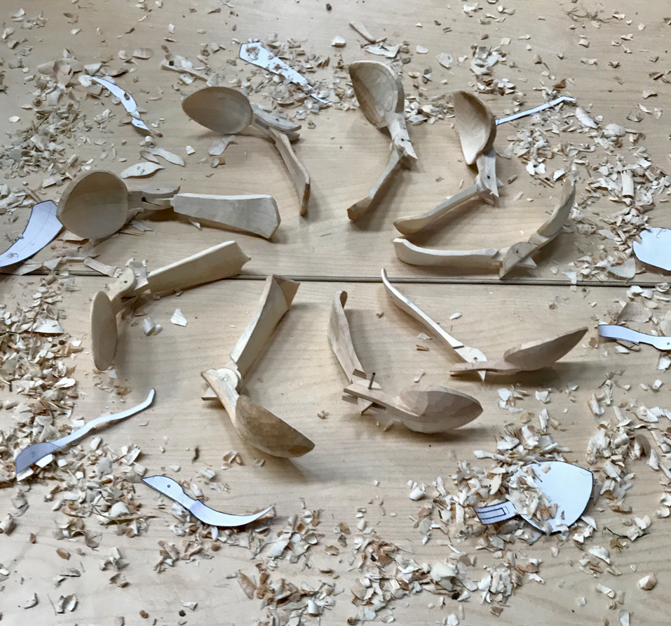 teaching how to make folding spoons