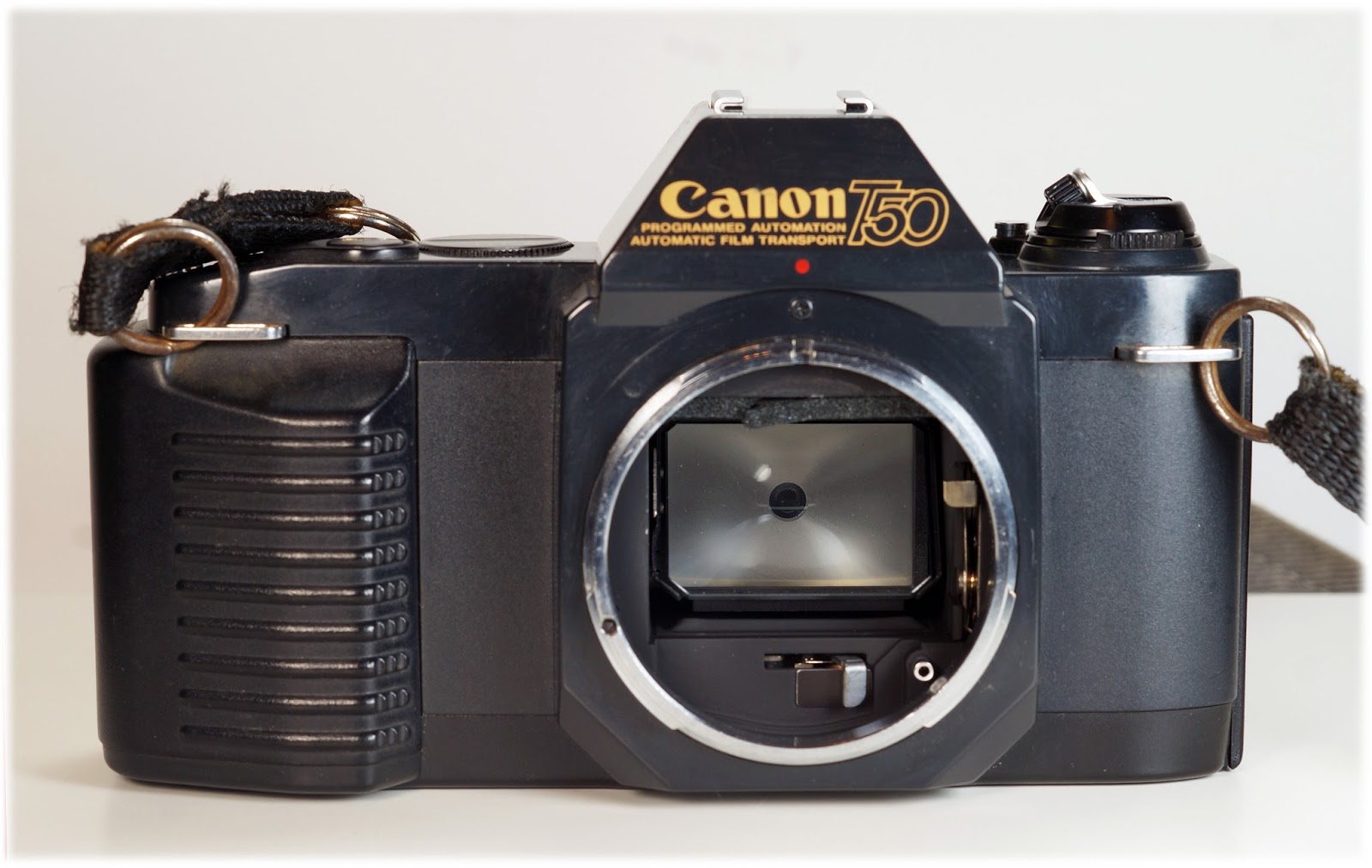 Canon T50 SLR film camera with Tou/Five Star 28-75mm Lens