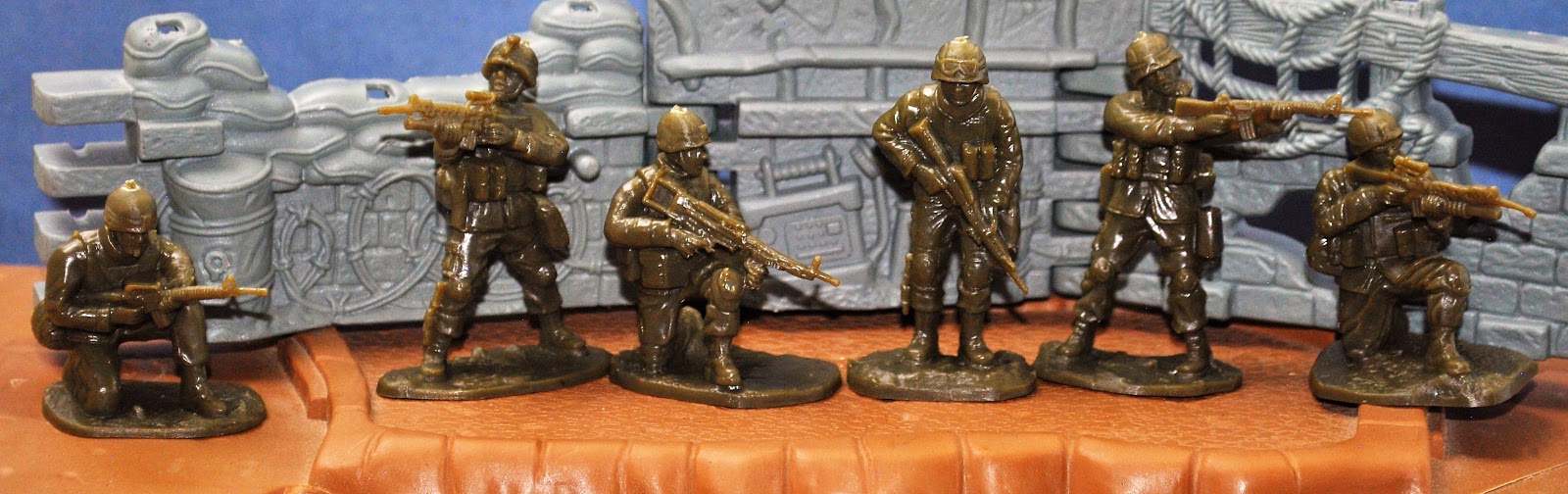 Modern Army Men: Armies in Plastic U.S. Marines and Taliban.
