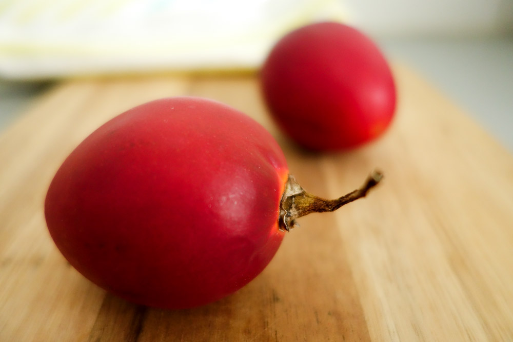 the indolent cook: ginger-honey poached tamarillo compote